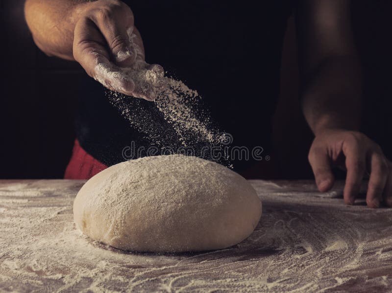 Chief Baker Preparing Dough for Bread in a Bakery. Kitchen Professional ...