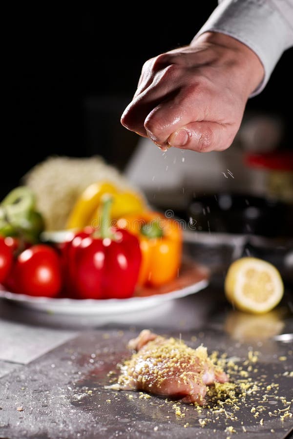 Chief Chops and Marinates Chicken. Professional Chef in a Kitchen of ...