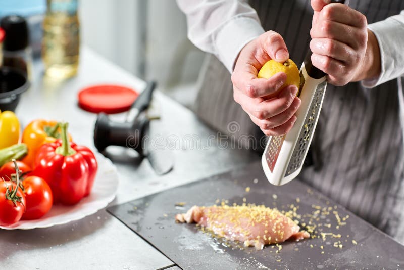 Chief Chops and Marinates Chicken. Professional Chef in a Kitchen of ...