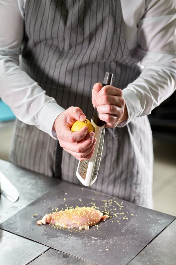 Chief Chops and Marinates Chicken. Professional Chef in a Kitchen of ...