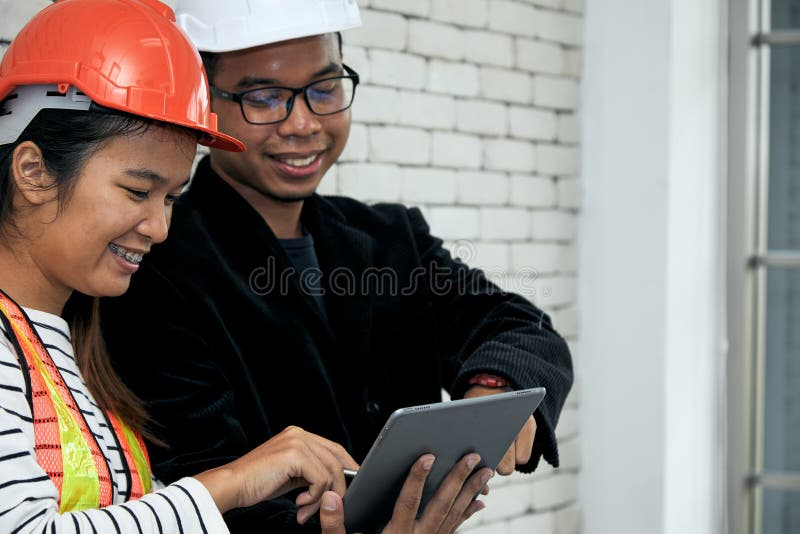 Chief Engineer Check Data in Tablet Together with Safety Officer Stock ...