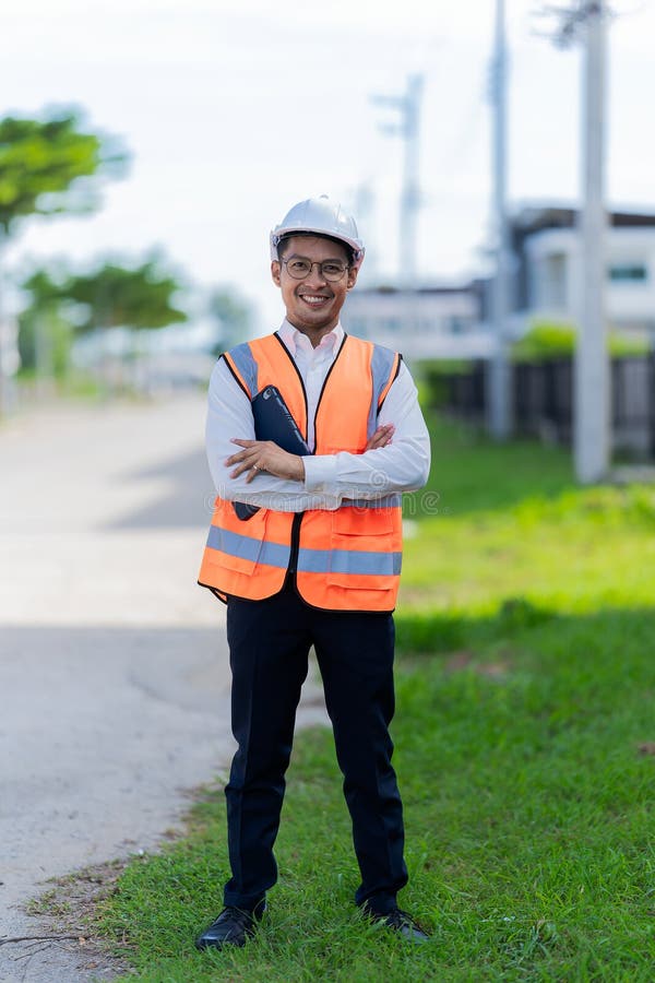 The Chief Engineer is Taking Notes on a Tablet while Inspecting a Two ...