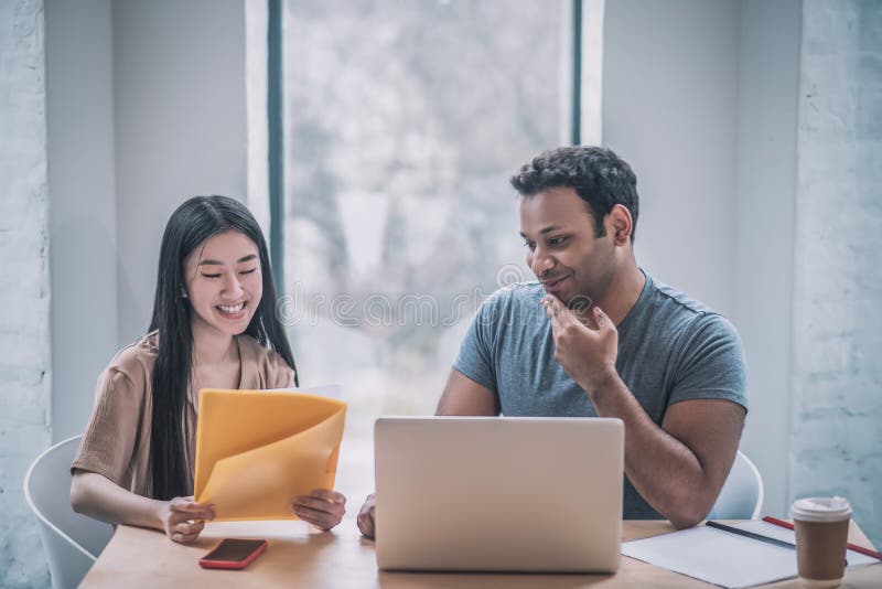 A Chief and His Assistant Working in the Office Stock Image - Image of ...