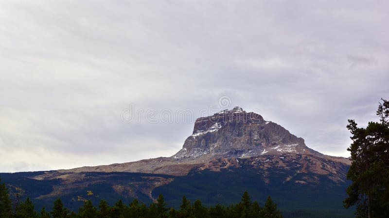Chief Mountain, North-side stock photo. Image of dusting - 101667980