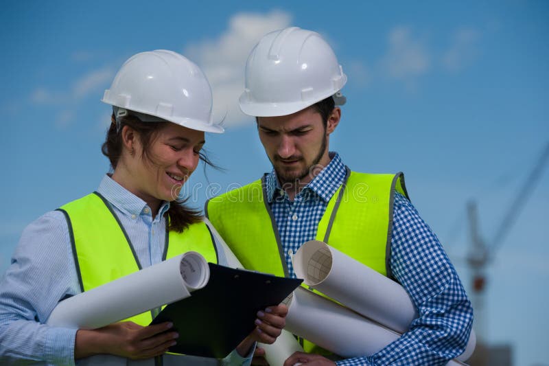 The Chief Project Engineer and the Foreman Agree on the Construction ...