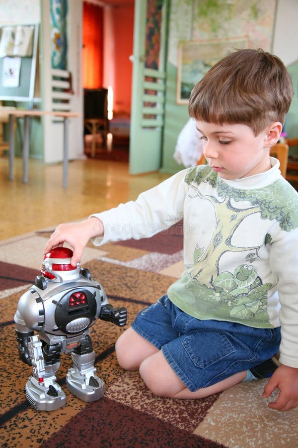Boy fixing robot stock photo. Image of expressions, child - 13095818