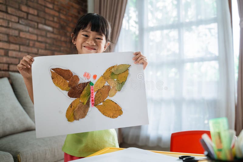 Child Activity Making Craft from Dry Leaves Stock Photo - Image of ...