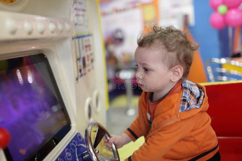 Child and Amusement Machine Stock Image - Image of human, amusement ...