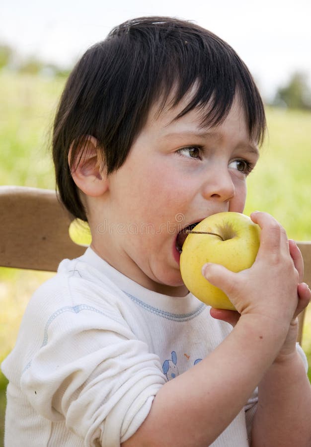 Child with apple stock image. Image of cute, caucasian - 18270119