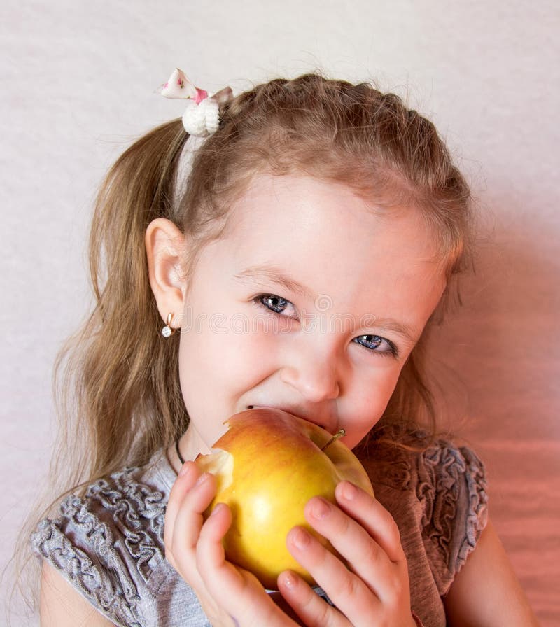 Child with apple stock image. Image of fruits, children - 50229587