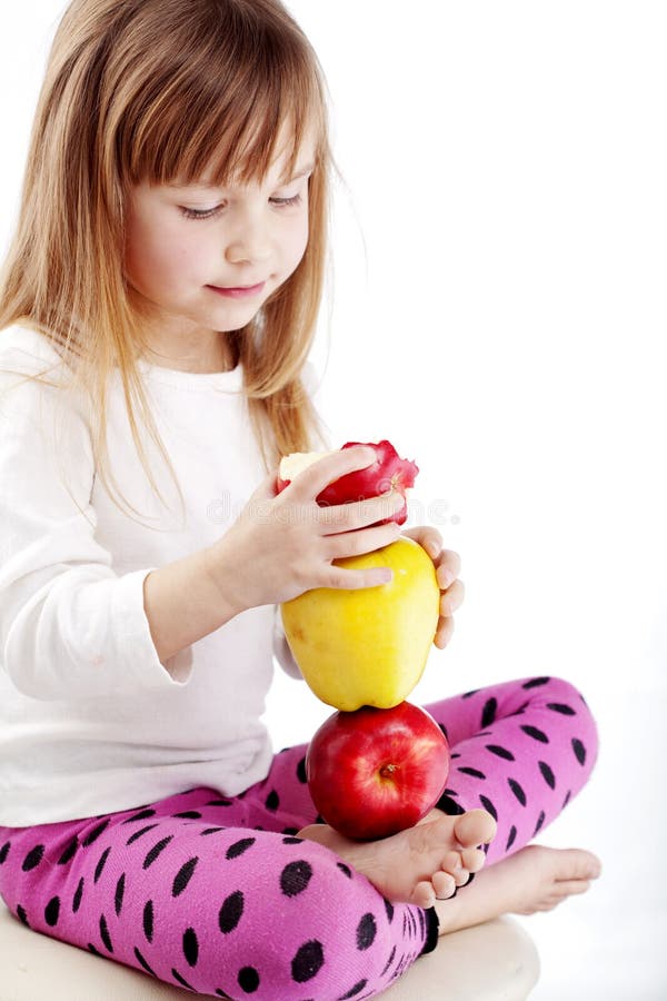 Child with apples stock photo. Image of innocent, beautiful - 14131190
