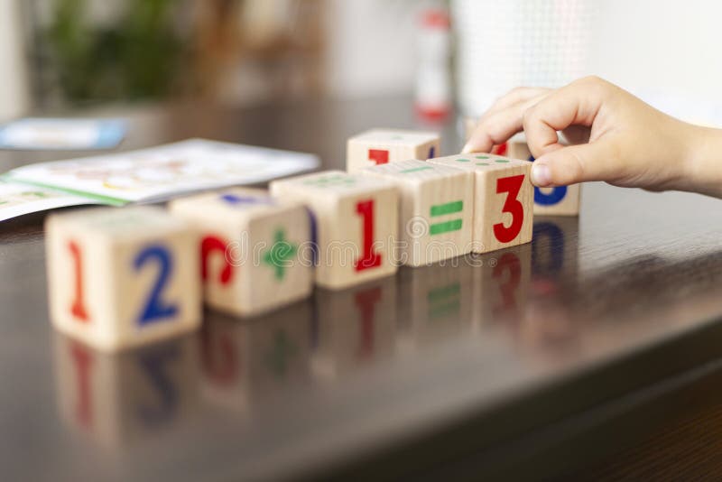 Child Arranging Number Blocks for Math Stock Photo - Image of ...