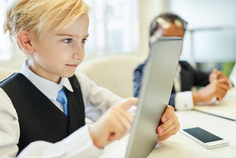 Child As a Manager or Consultant with Tablet Computer Stock Image ...