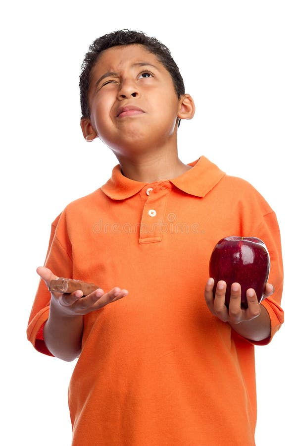 Child Asking for Wisdom To Choose Food Stock Photo - Image of candy ...