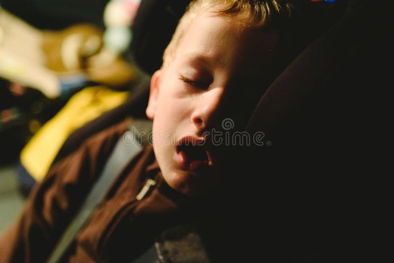 Child Asleep in His Extenuated Car Seat Stock Photo - Image of chair ...
