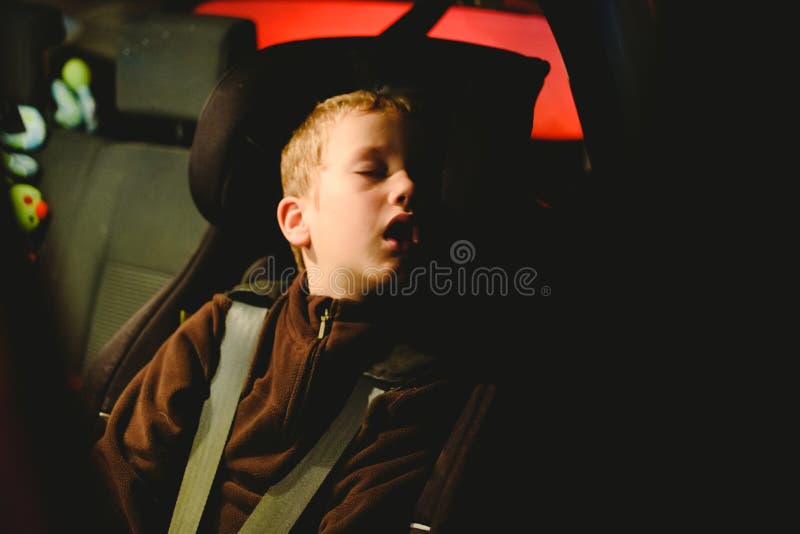 Child Asleep in His Extenuated Car Seat Stock Photo - Image of dozing ...