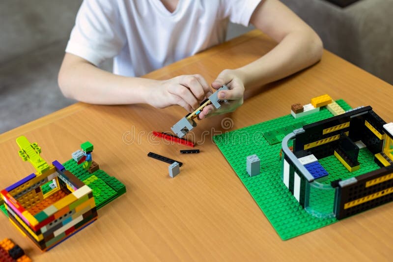 Child Assembling Colorful Plastic Bricks, Building Creative Structures ...