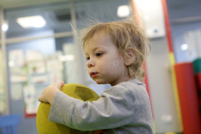 Child with ball stock photo. Image of clothing, caucasian - 85711200