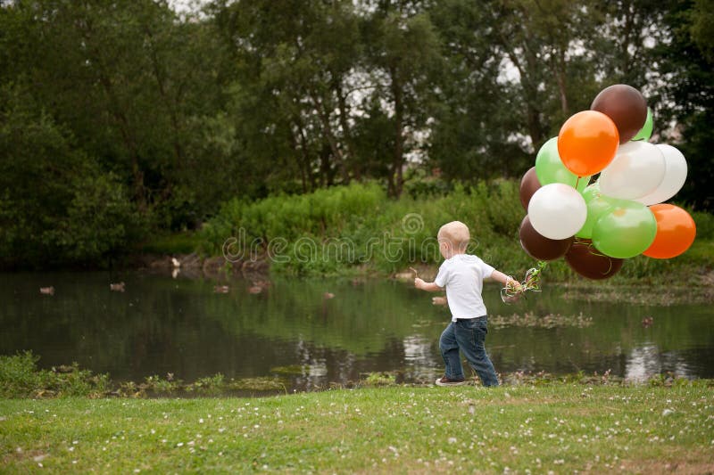 Child with balloons stock image. Image of enjoyment, happiness - 13968373