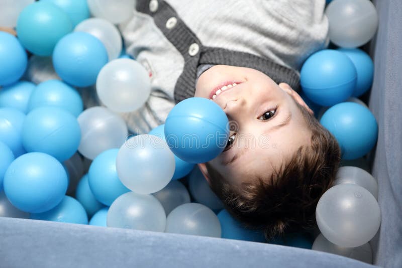 Child on the balls stock image. Image of human, action - 69115065