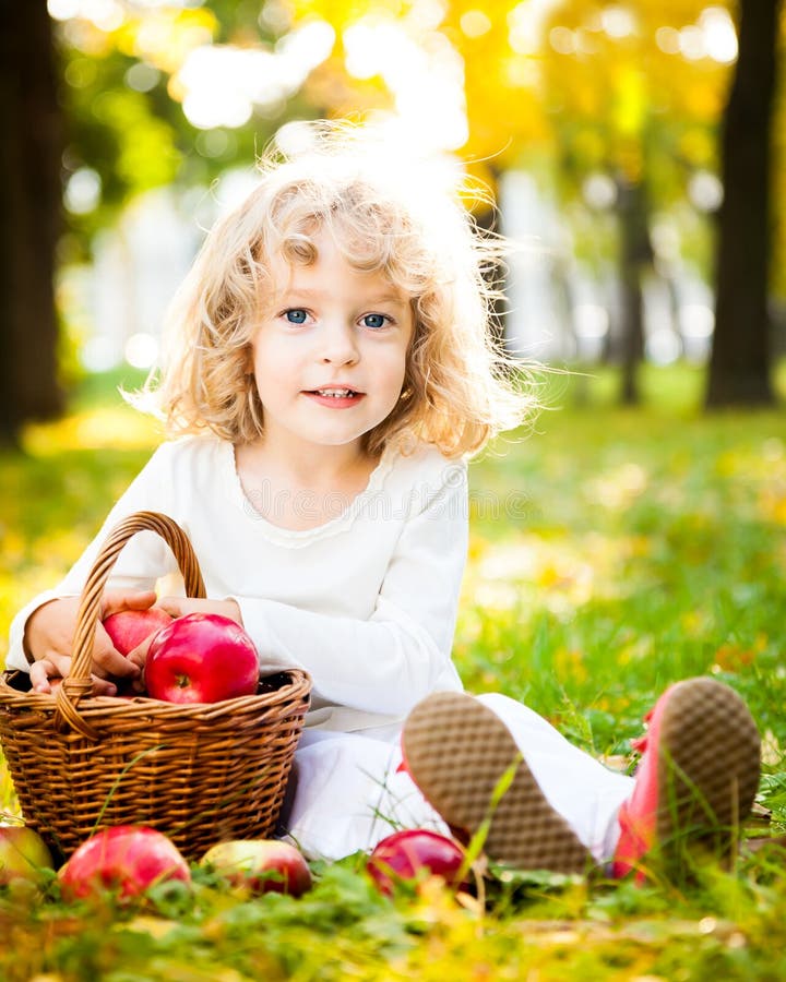 Child with Basket of Apples in Autumn Park Stock Photo - Image of food ...
