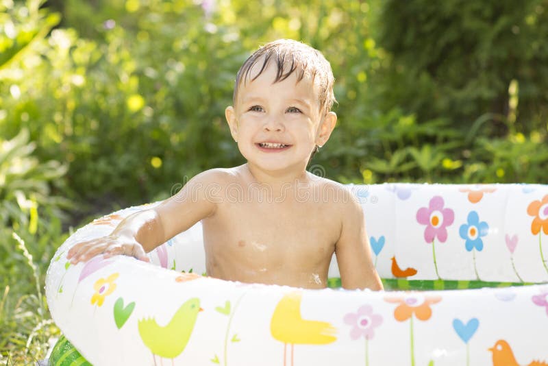 The child bathes stock photo. Image of preschool, recreational - 56032386