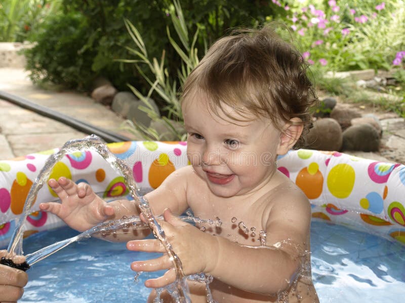 Child bathes stock image. Image of childrens, spray, laugh - 78882455