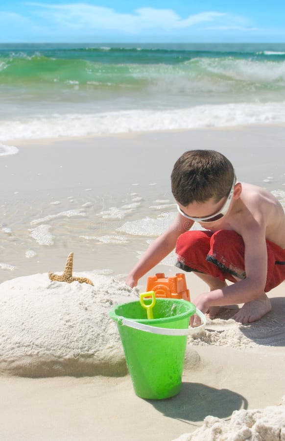 Child at beach stock photo. Image of playing, seashore - 14000656
