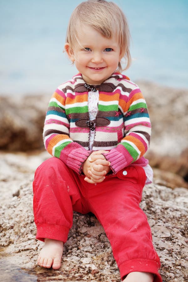 Child at the beach stock photo. Image of joyful, clothing - 20193774