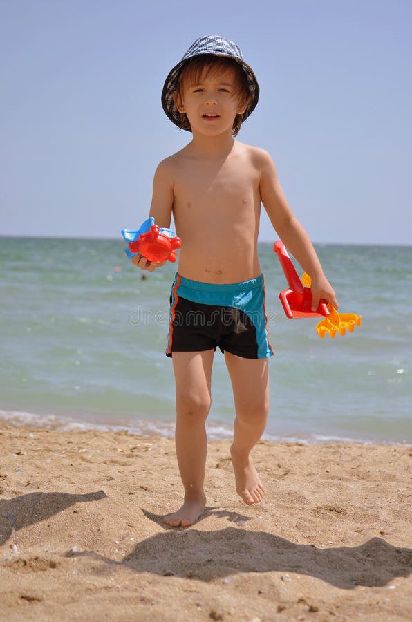 Child at the beach stock image. Image of beach, portrait - 26034071