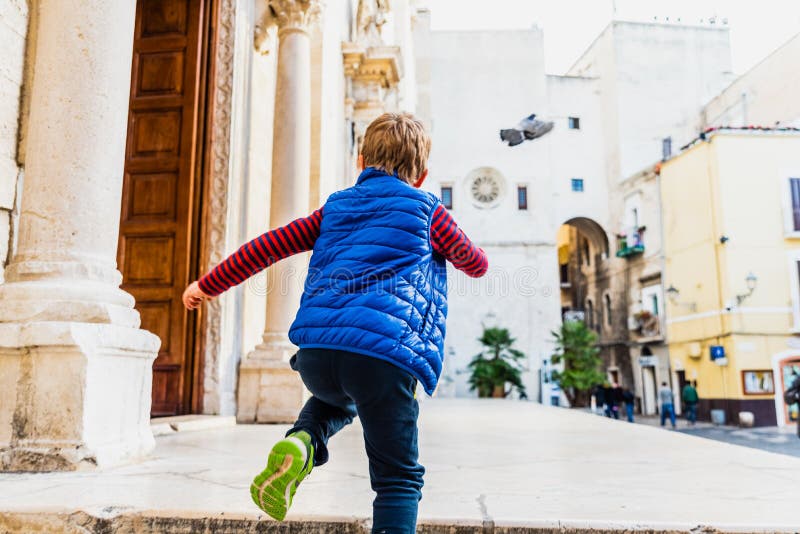 Child from Behind Running To Enter a Church Stock Image - Image of ...