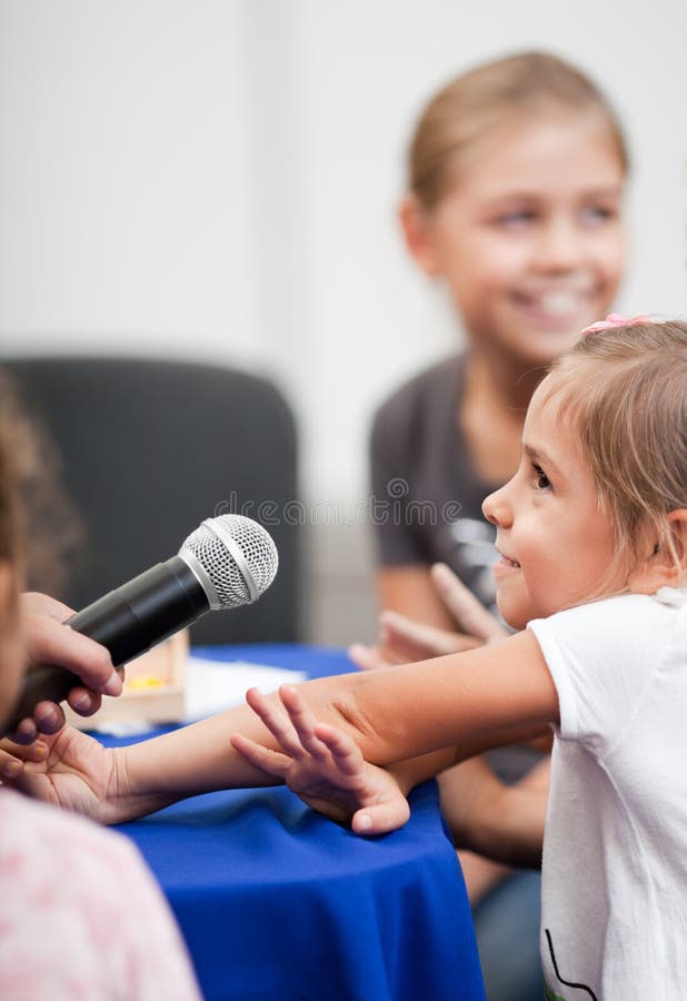 Child being interviewed stock photo. Image of discussion - 29542670