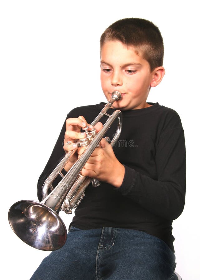 Child Blowing Trumpet stock photo. Image of practice, mean - 424576