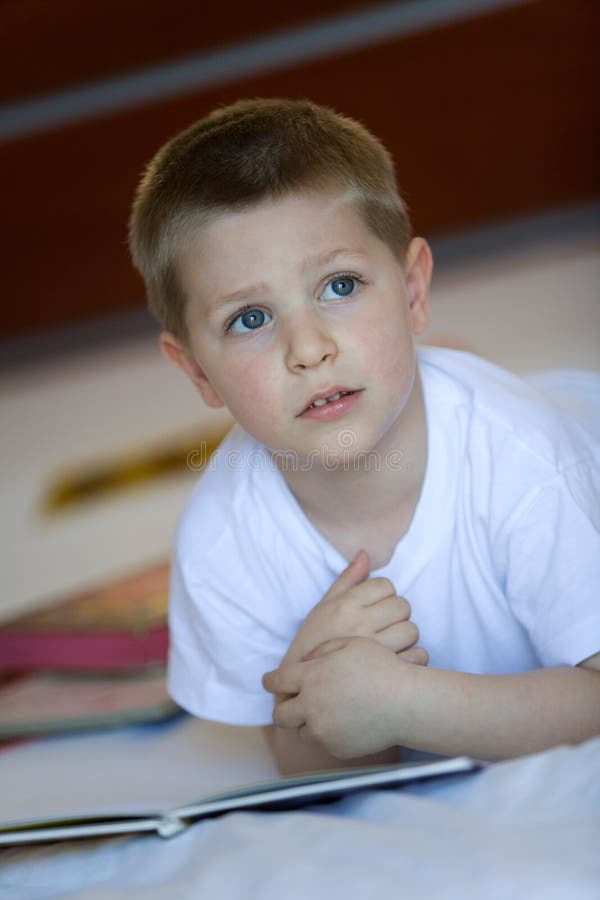 Child with books stock image. Image of attention, look - 2439579