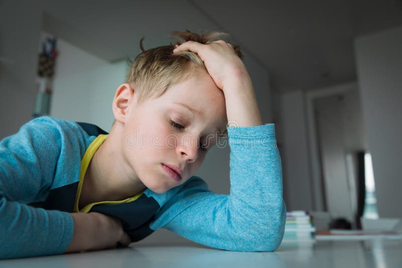 Child Bored of Doing Homework, Kid Stressed, Boy Having Headache Stock ...