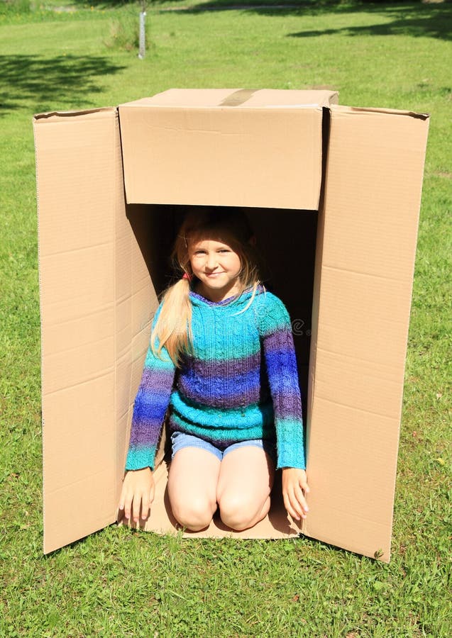 Child in box stock image. Image of paper, meadow, child - 40962675