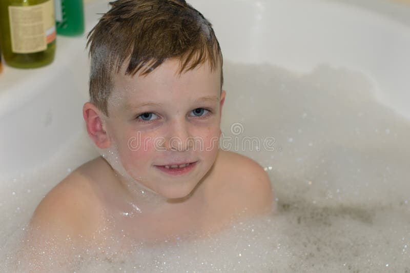 Child boy bathing stock photo. Image of camera, blond - 84811568