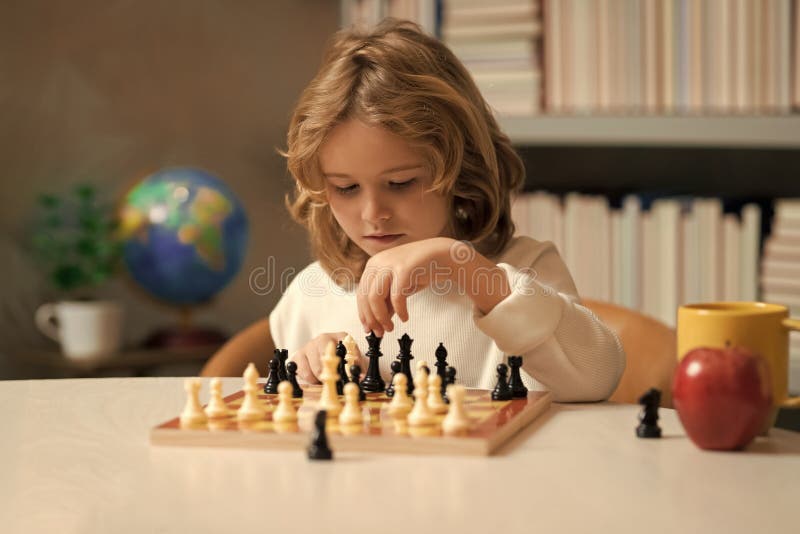 Child Boy Developing Chess Strategy, Playing Board Game. Intelligent ...