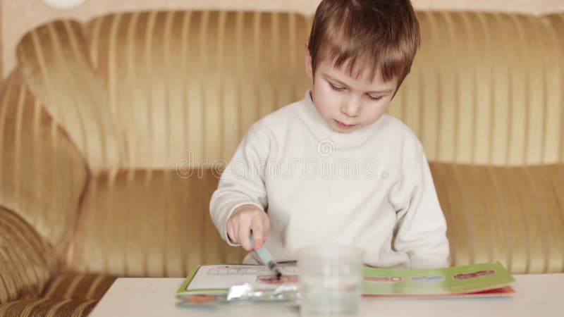 Child Boy Draws with a Water Marker Stock Video - Video of children ...