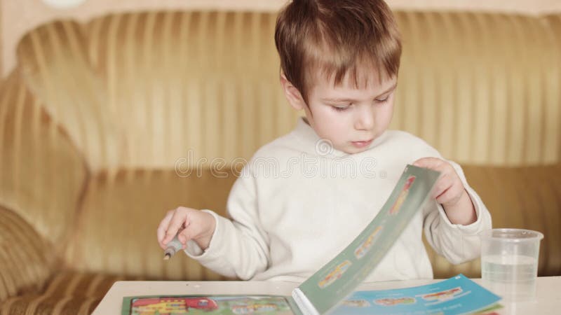 Child Boy Draws with a Water Marker Stock Video - Video of creative ...