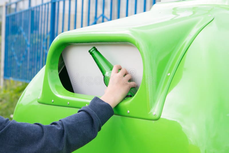 Child Boy Hand Throwing Empty Glass Bottle into Trash Can Stock Image ...