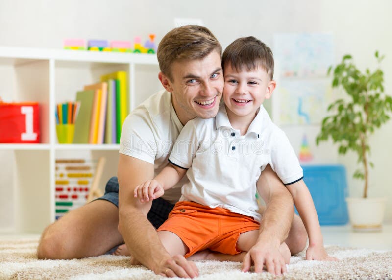Child Boy and His Dad at Home Stock Image - Image of daddy, cute: 57825447