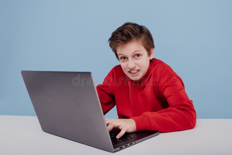 Child Boy Near the Table with Laptop Stock Image - Image of happy ...