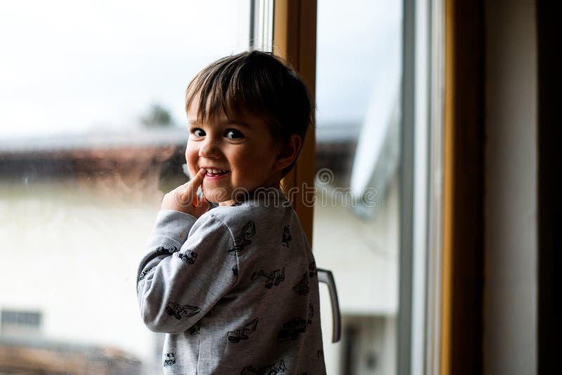 Child Boy Near Window. Kid Face Portrait. Stock Photo - Image of young ...