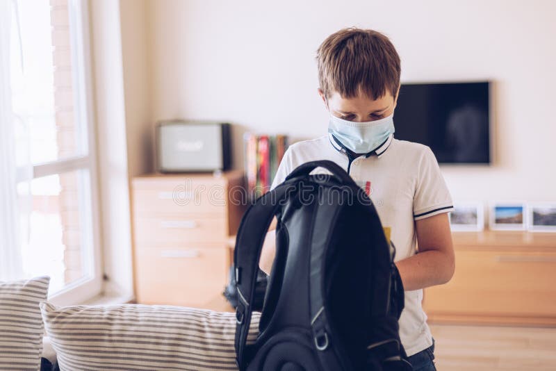 Child Boy Packing His School Backpack at Home. Stock Photo - Image of ...