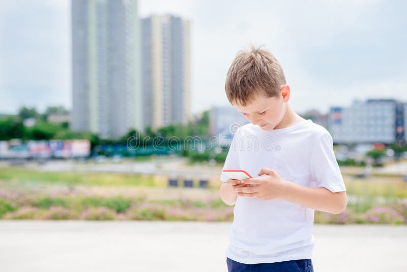 Child Boy Playing Mobile Games on His Smartphone Stock Image - Image of ...