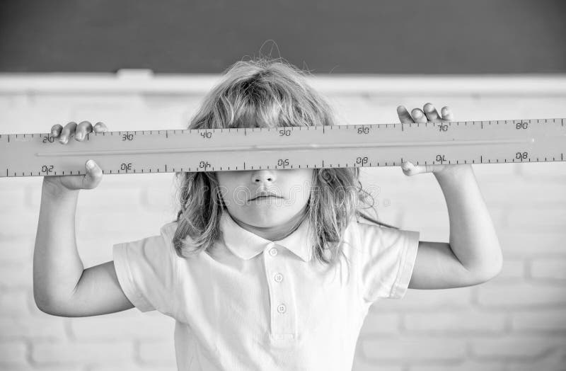 Child Boy in School Holding Math Ruler Tool, School Stock Photo - Image ...