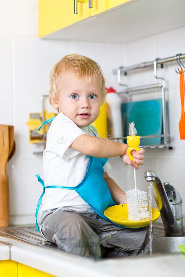 Child Boy Washing Dishes and Having Fun in the Stock Photo - Image of ...