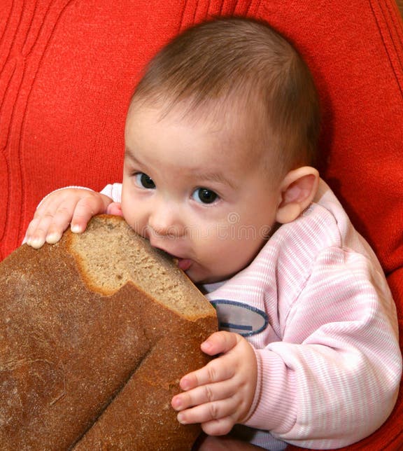 The child with bread stock image. Image of hungry, child - 4014527