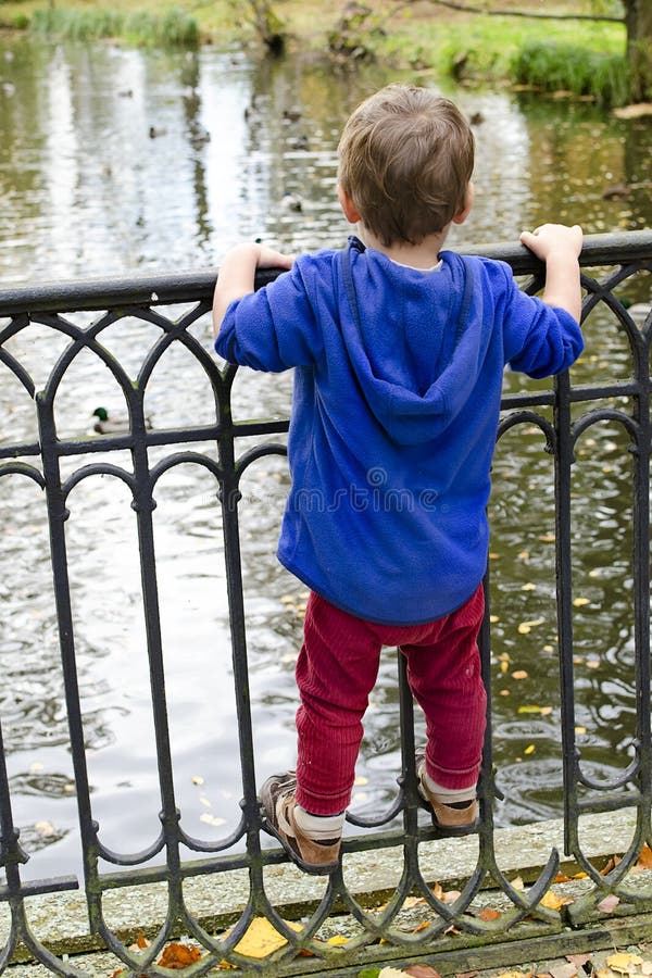 Child on bridge stock image. Image of standing, wrough - 42885999